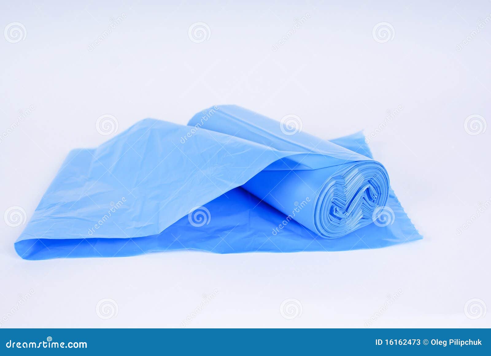 Roll of blue trash bags stock image. Image of housework - 16162473