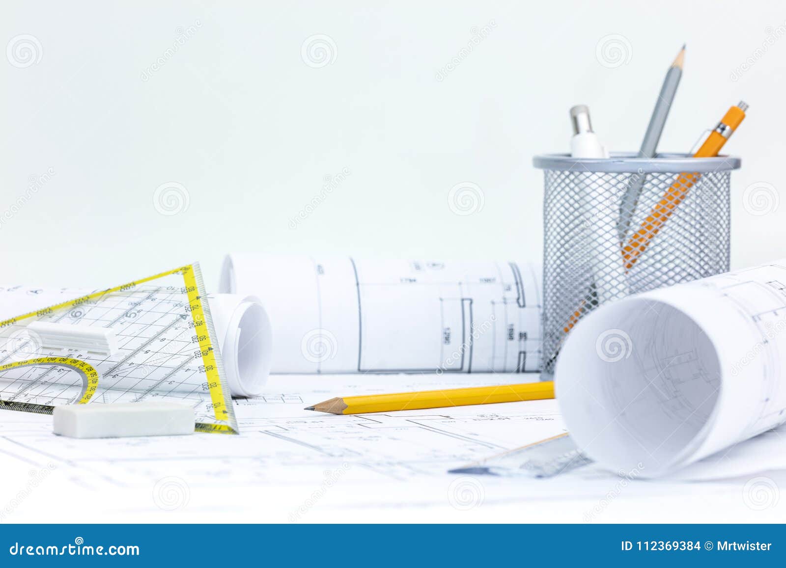 Roll Blueprints with Engineering Drawing Tools on Architect Work Stock ...