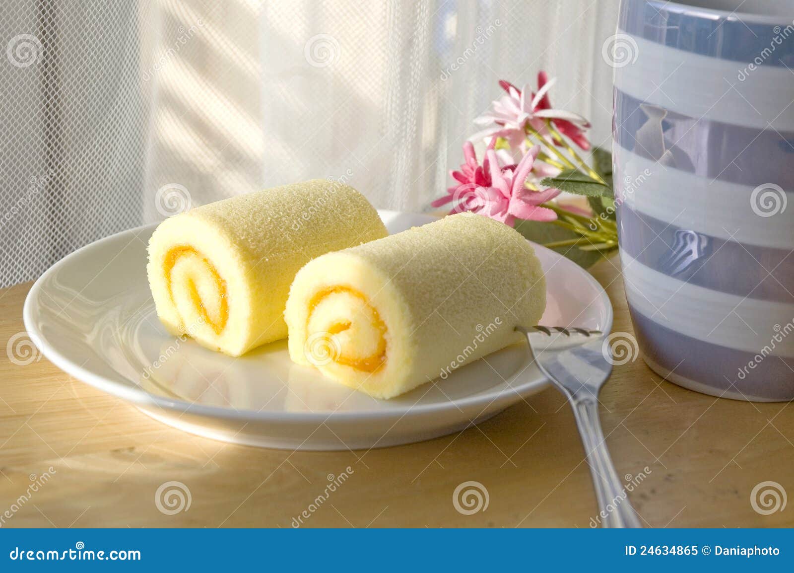 Roll cake on plate stock image. Image of breakfast, sunshine - 24634865