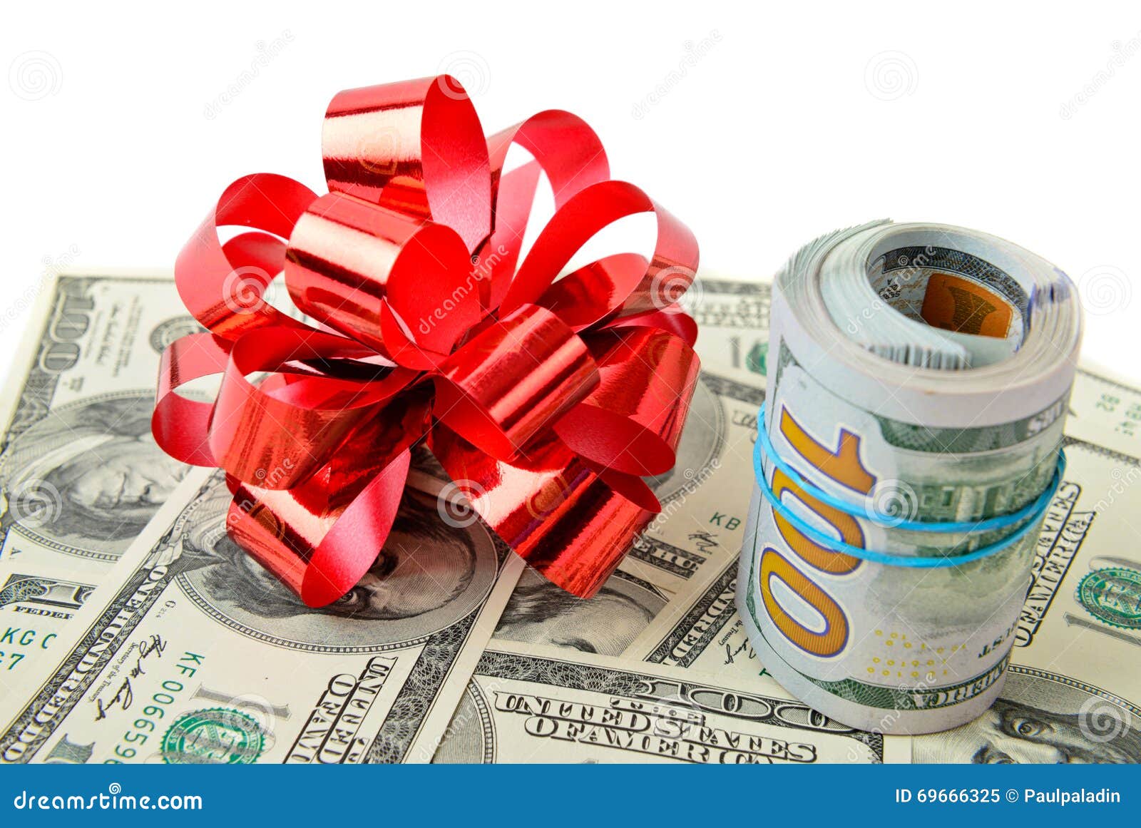 Roll of cash with red bow stock image. Image of business - 69666325