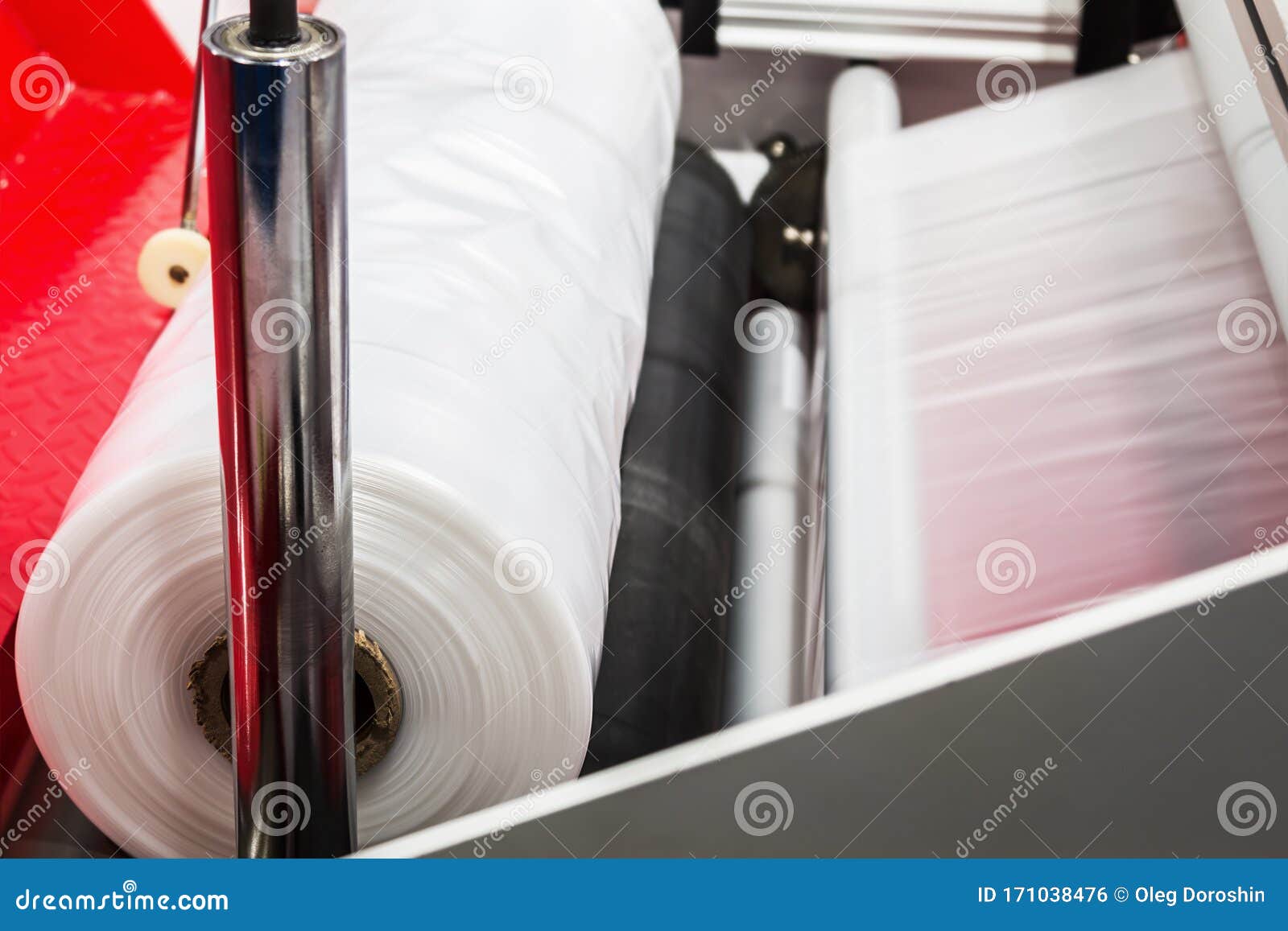 Roll of Cellophane from the Conveyor in Production Stock Photo - Image ...