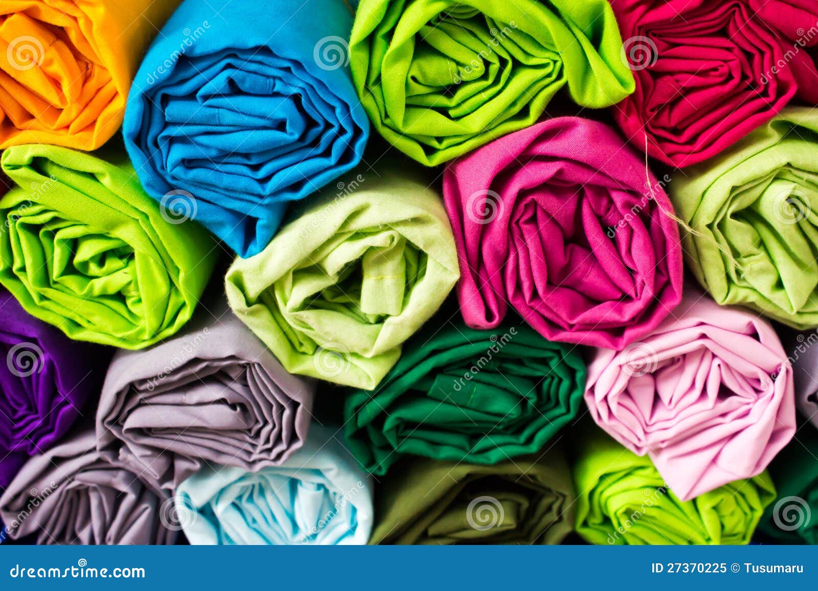 Roll Clothes To Sort through the Mess. Stock Image - Image of blue ...