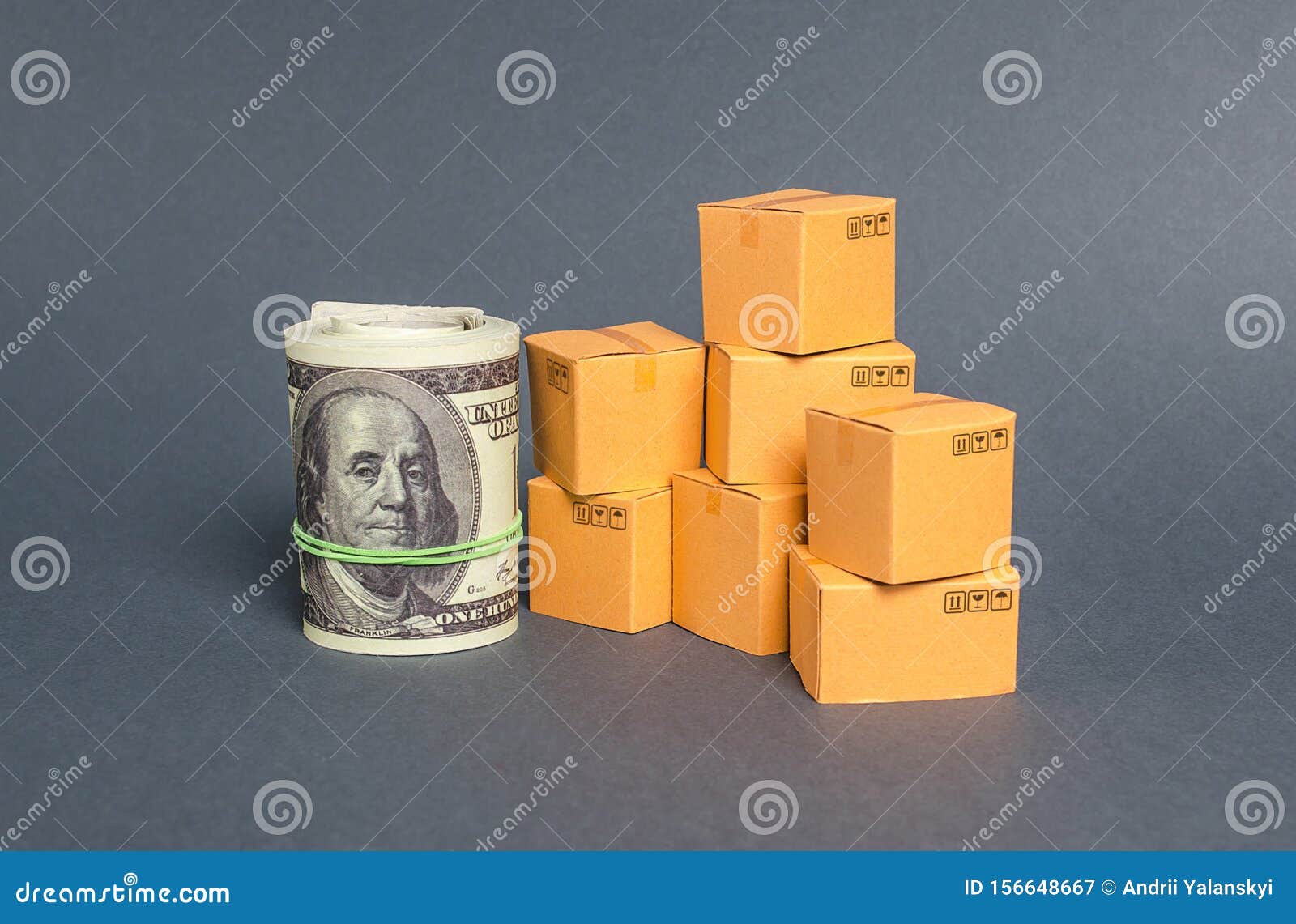 Roll of Dollars and Cardboard Boxes. Business and Industry. the Concept ...
