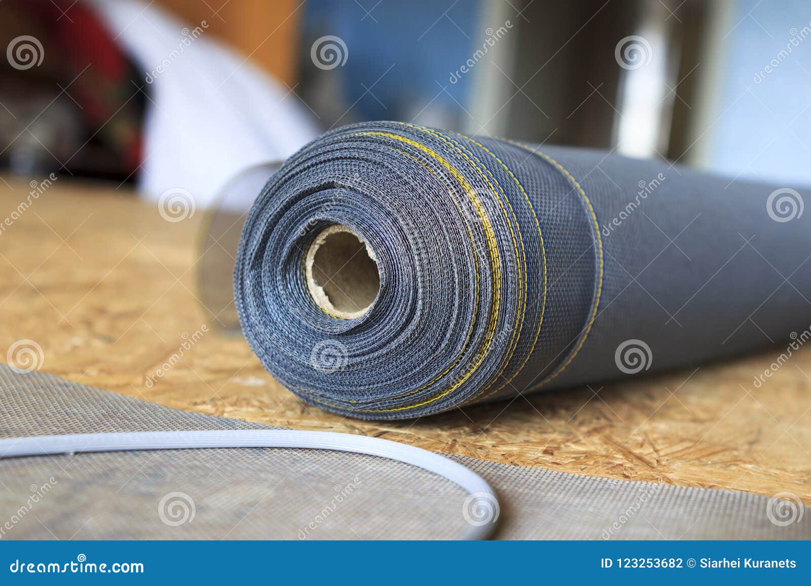 A Roll of Mosquito Netting, As Well As a Roller and Sealing Roller ...
