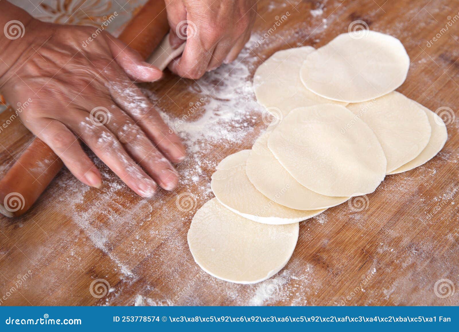Roll Out Dumpling Wrappers on Board Stock Photo - Image of roll, making ...