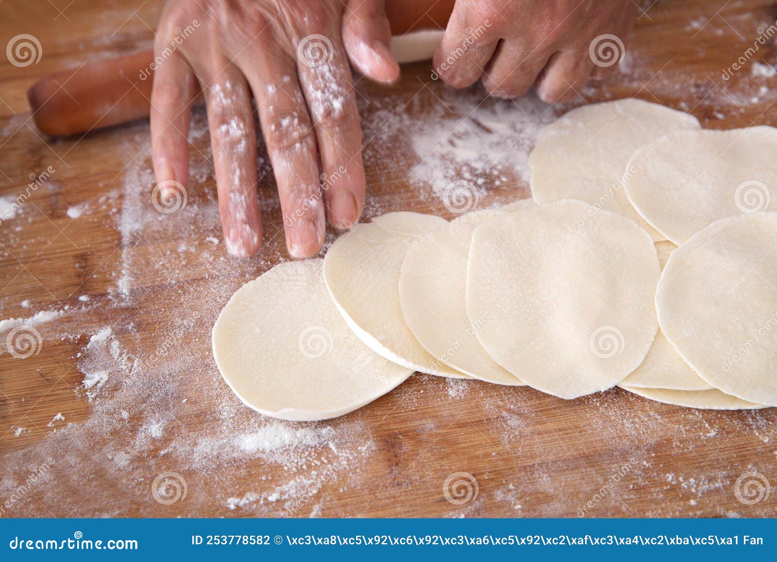 Roll Out Dumpling Wrappers on Board Stock Photo - Image of dough ...