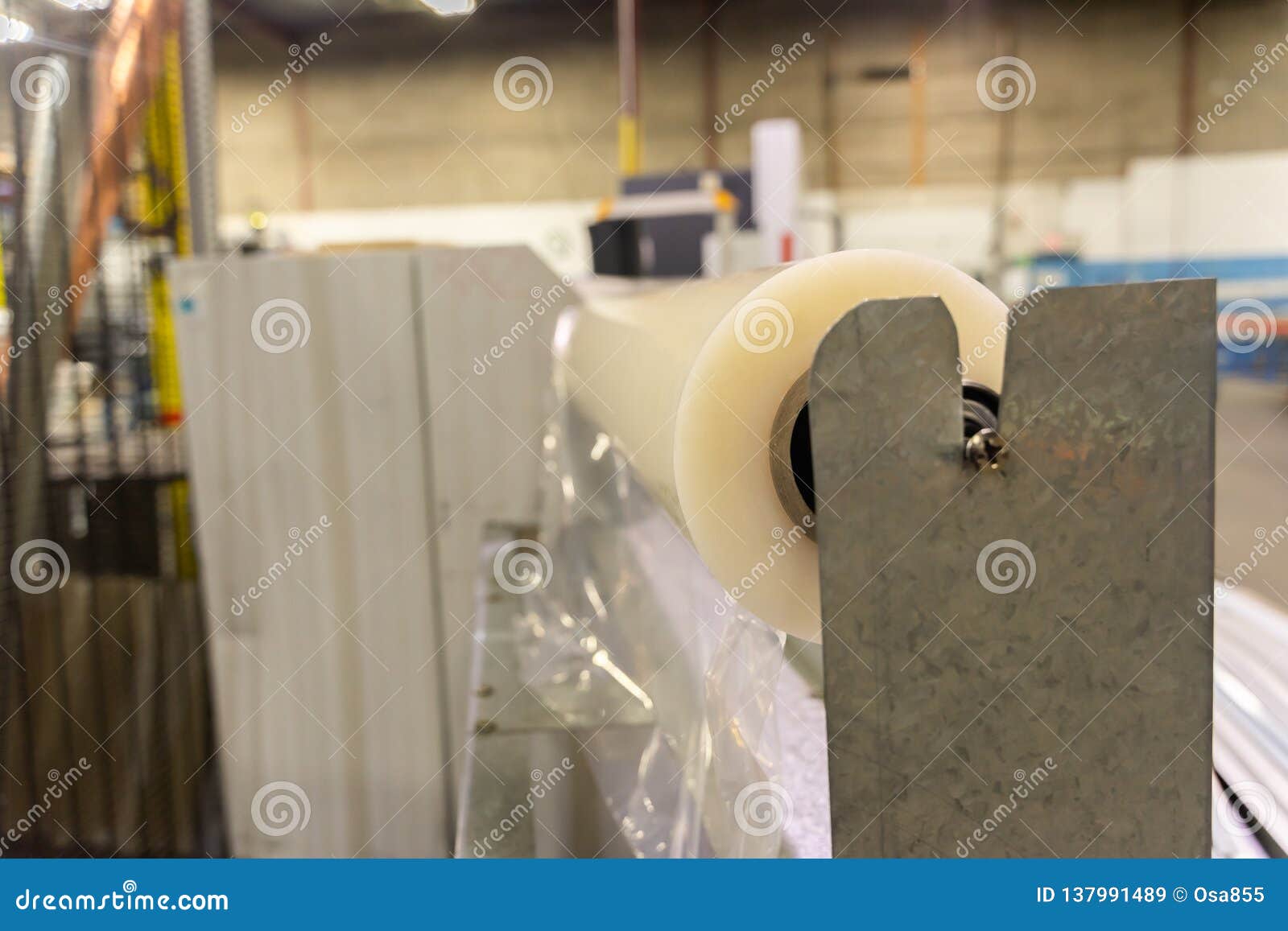 Roll of Plastic Wrapping Material in Factory Workshop Packaging Stock ...