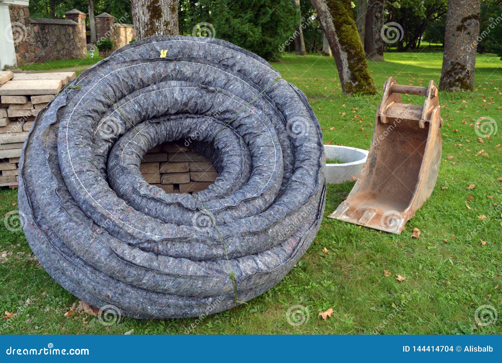 Roll Stack Drain Drainage Pipe with Protective Cover in City Park Stock ...