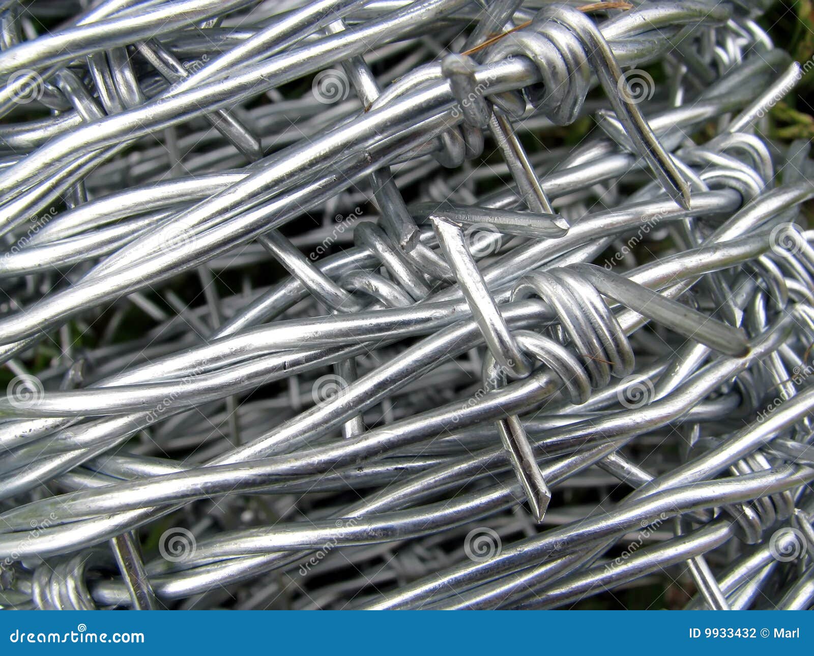 Roll of Steel Barbed Wire stock photo. Image of fortify - 9933432