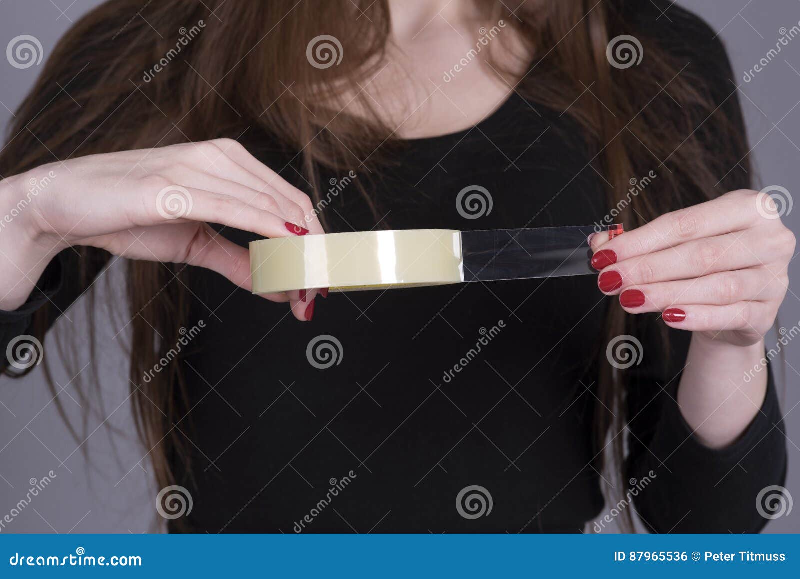 Roll of Sticky Tape with Hands of a Woman Stock Photo - Image of office ...