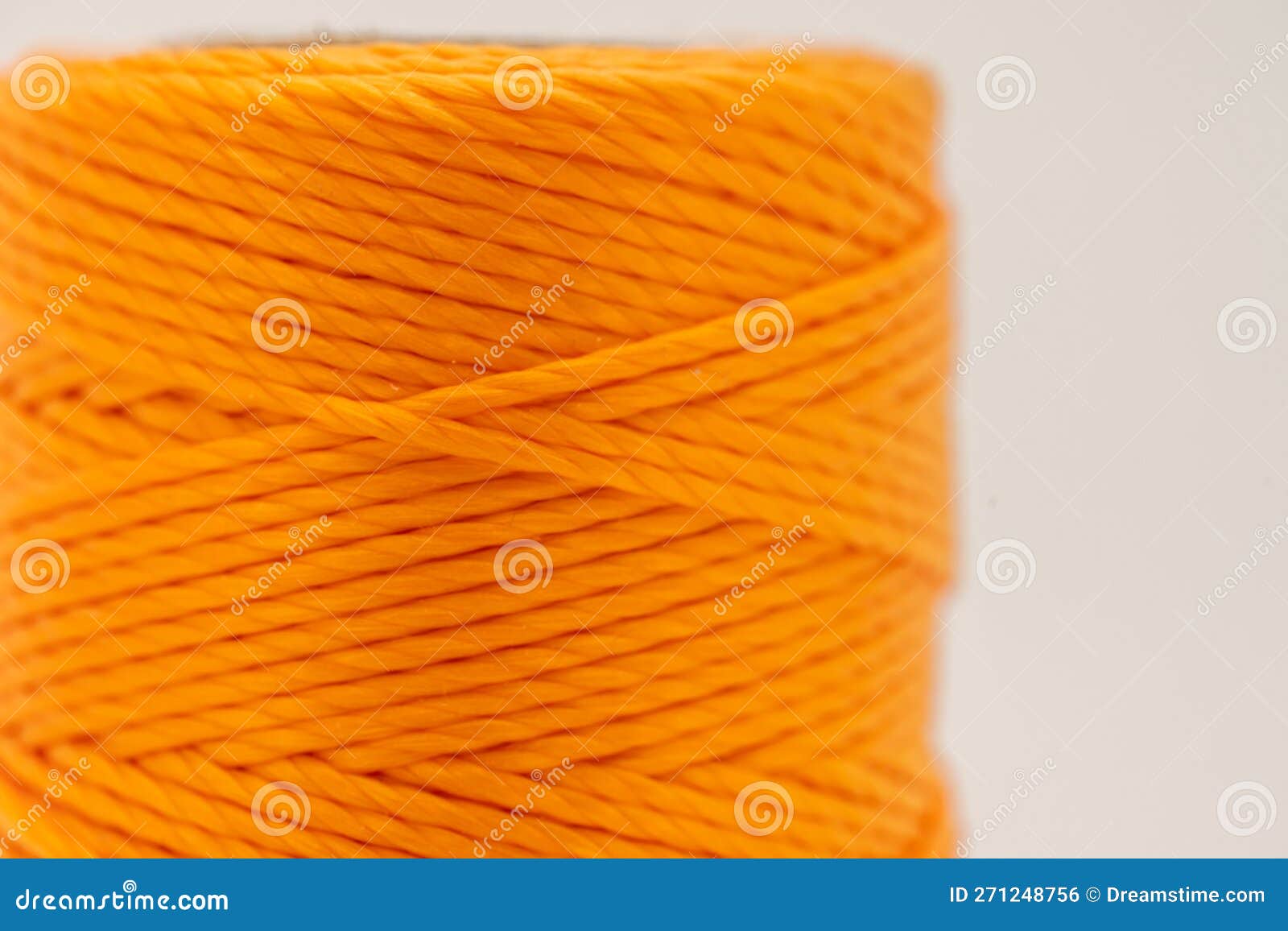 A Roll of Synthetic Orange Thread.. Stock Photo - Image of equipment ...