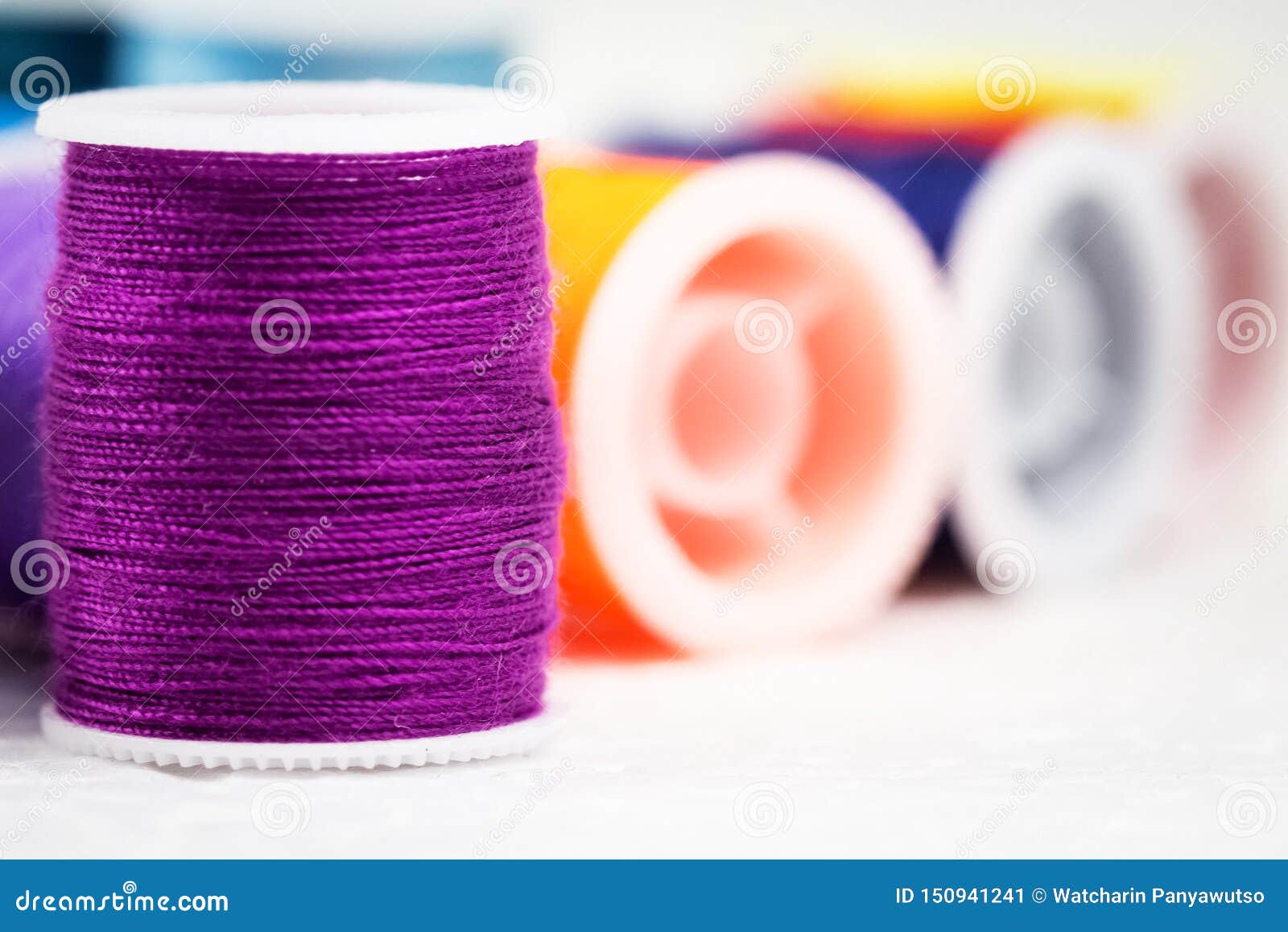 The Roll of Thread Put at the Left Side on Background,purple Color ...