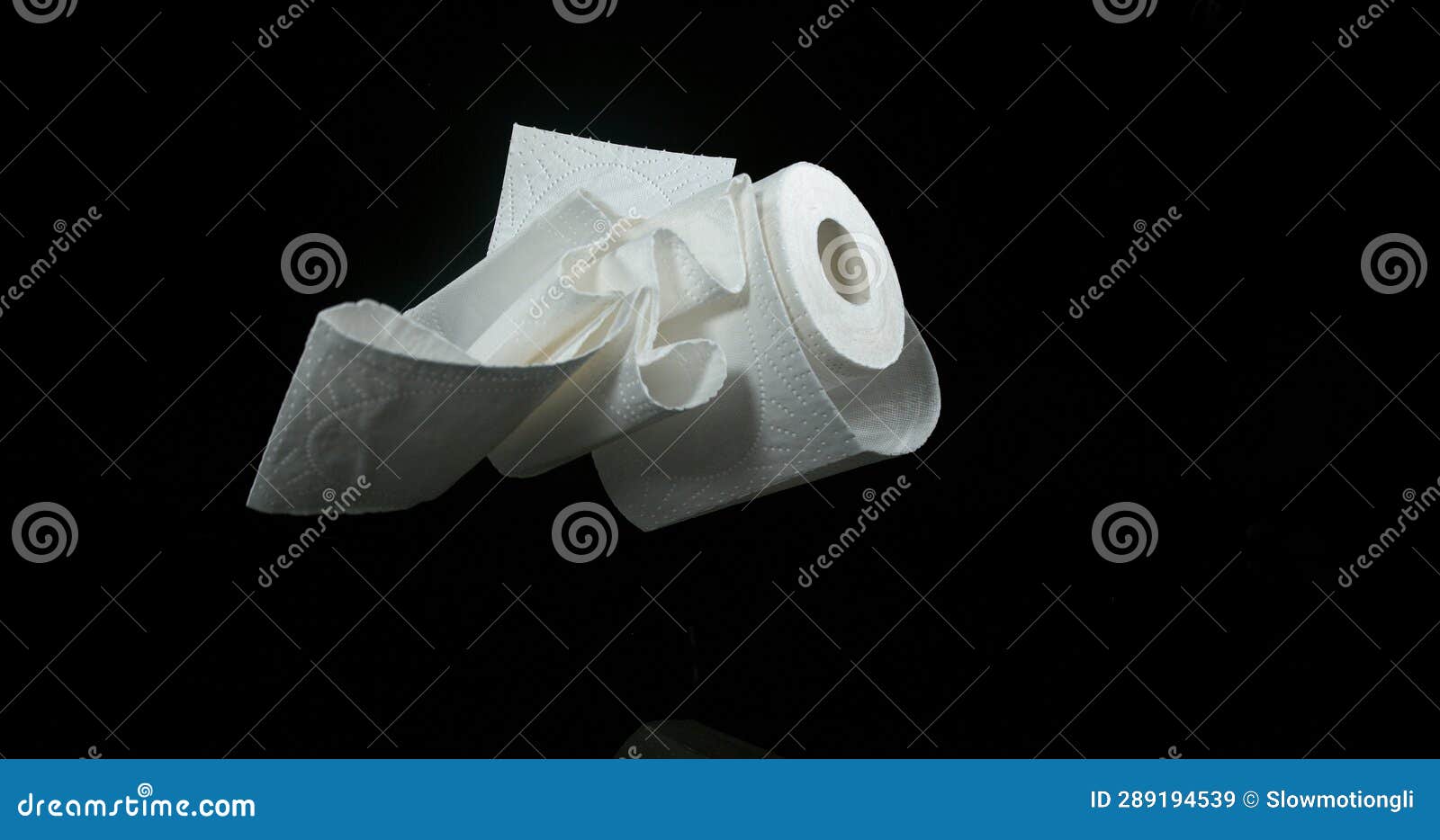 Roll of Toilet Paper Falling on Black Background Stock Image - Image of ...