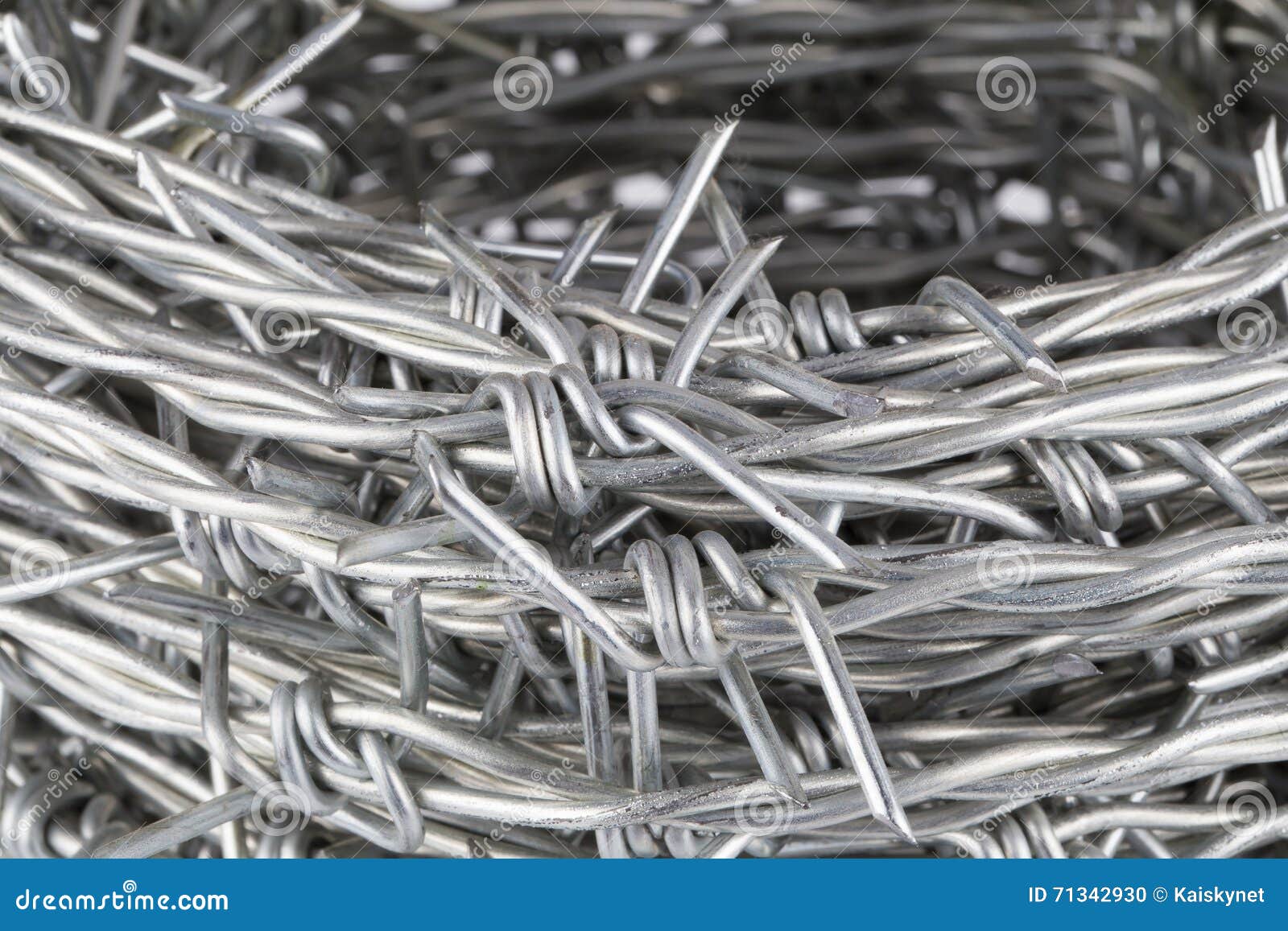 Roll Up of Barbed Wire on White Background Stock Photo - Image of iron ...