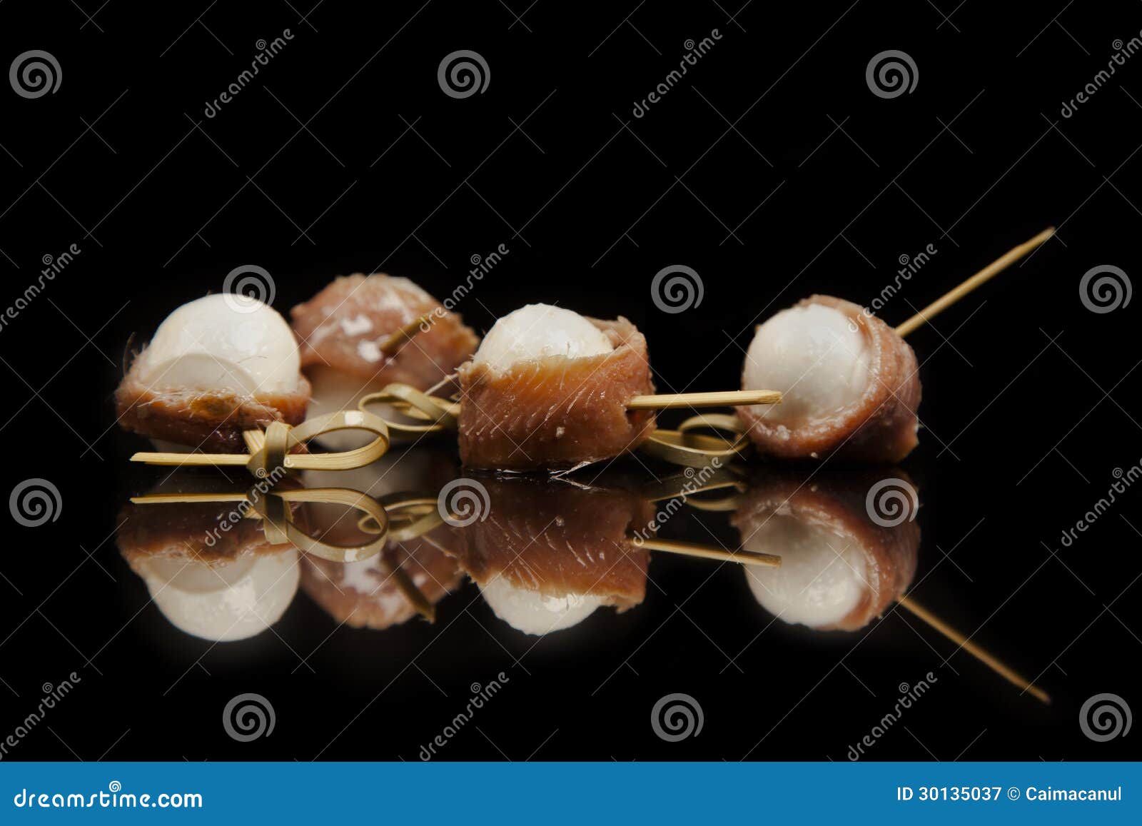 Rolled anchovy on cheese stock image. Image of antipasti - 30135037
