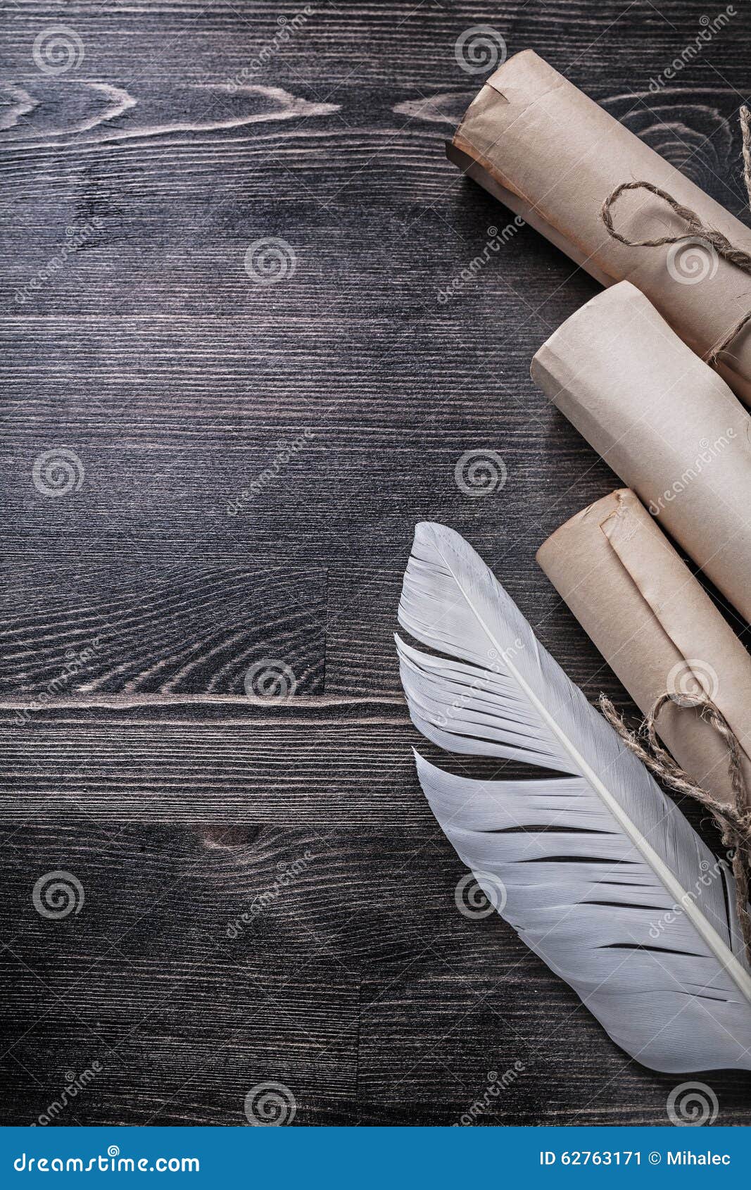 Rolled Ancient Documents Feather on Wooden Board Stock Image - Image of ...