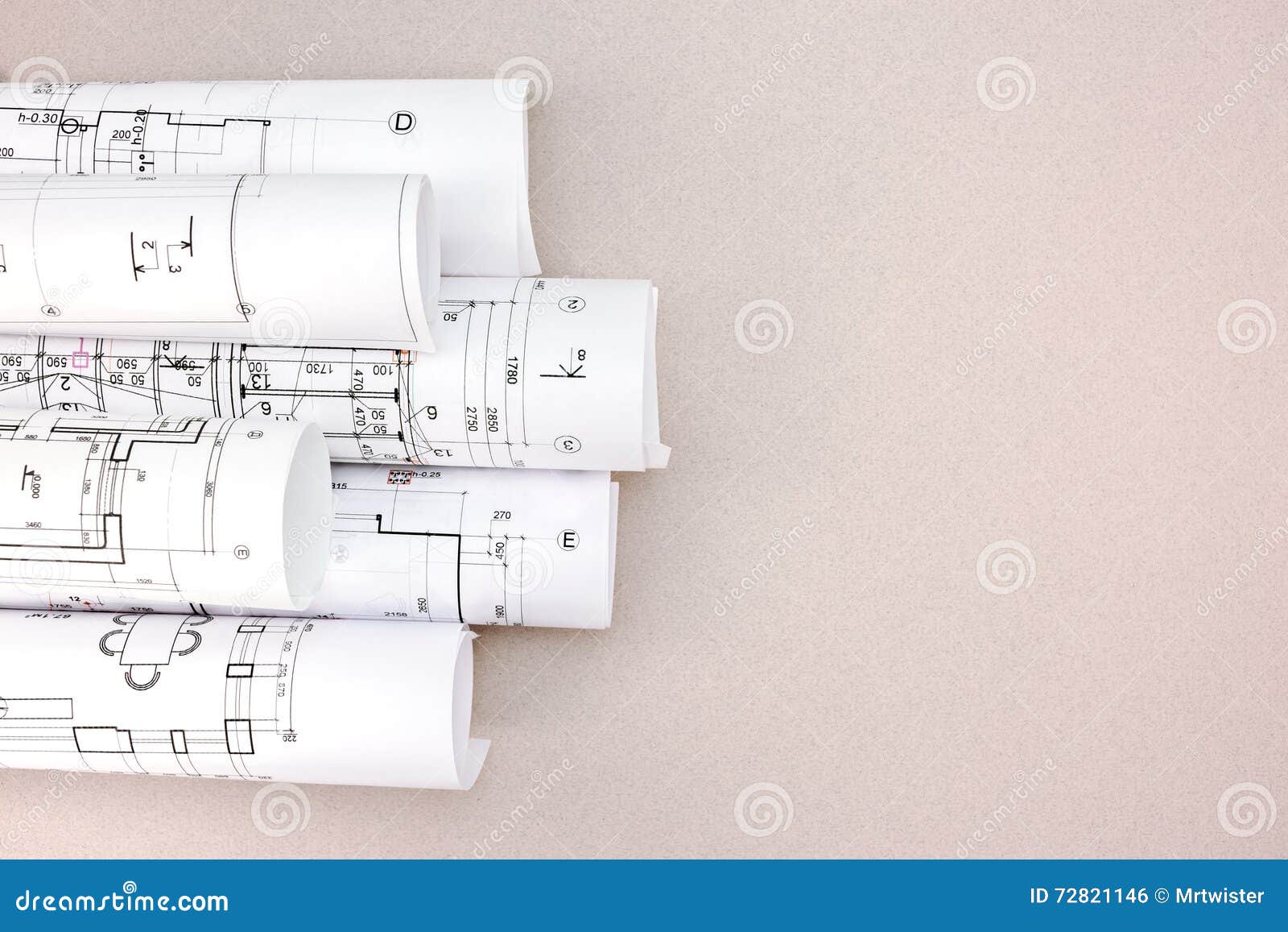 Rolled Architectural Blueprints and Construction Plans on Desk Stock ...