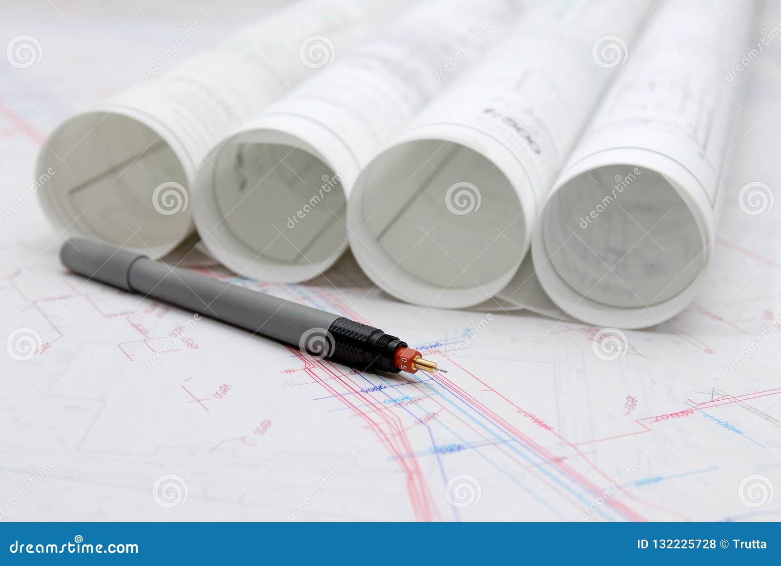 Rolled Architectural Plans and Drawing Utensils Stock Photo - Image of ...