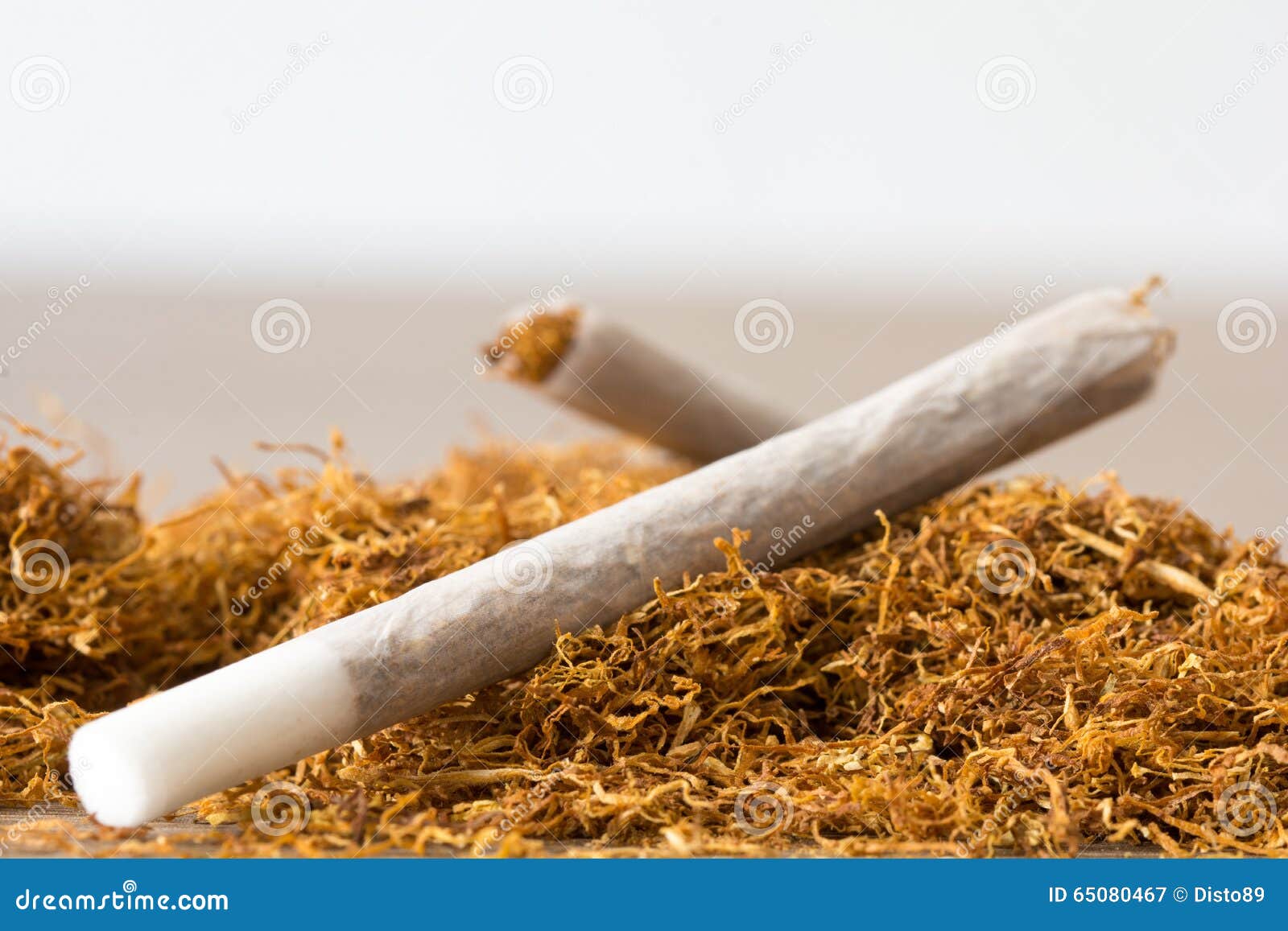 Rolled cigarettes stock image. Image of pleasure, stack - 65080467