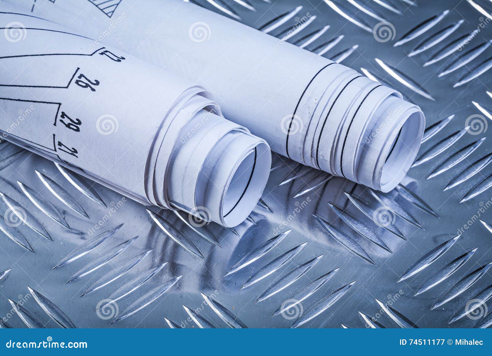 Rolled Construction Drawings On Channeled Metal Sheet Royalty-Free ...