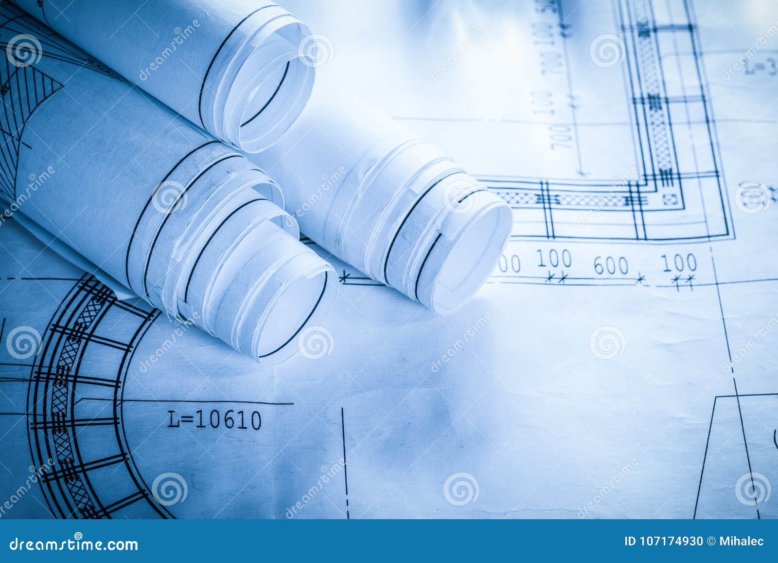 Rolled Construction Plans on Blueprint Stock Photo - Image of ...