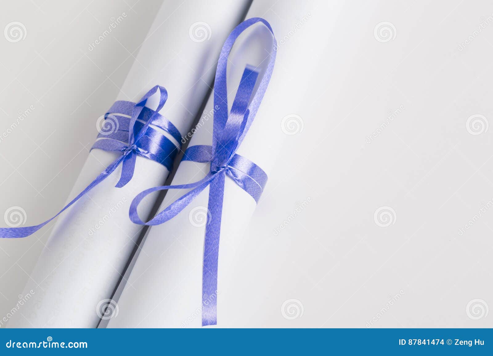 Rolled diploma or paper stock photo. Image of paper, achievement - 87841474