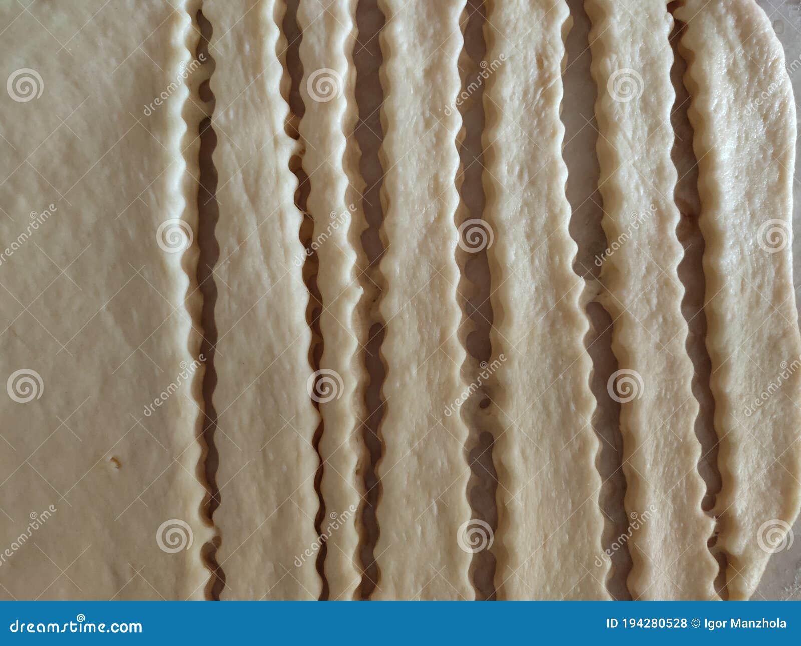 Rolled Dough, Cut into Strips. Dough in Macro Stock Photo - Image of ...