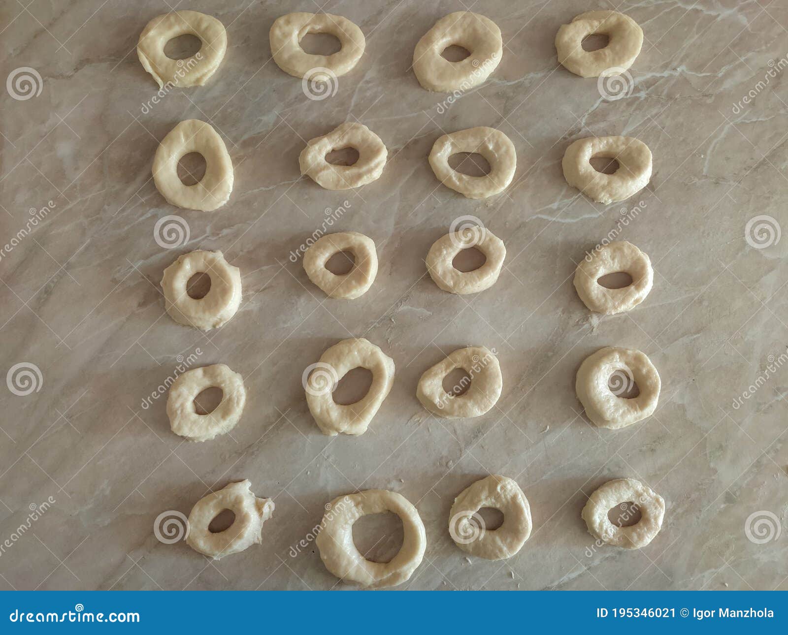 Rolled Dough for Donuts. Cutting from Fresh Dough for Traditionally ...