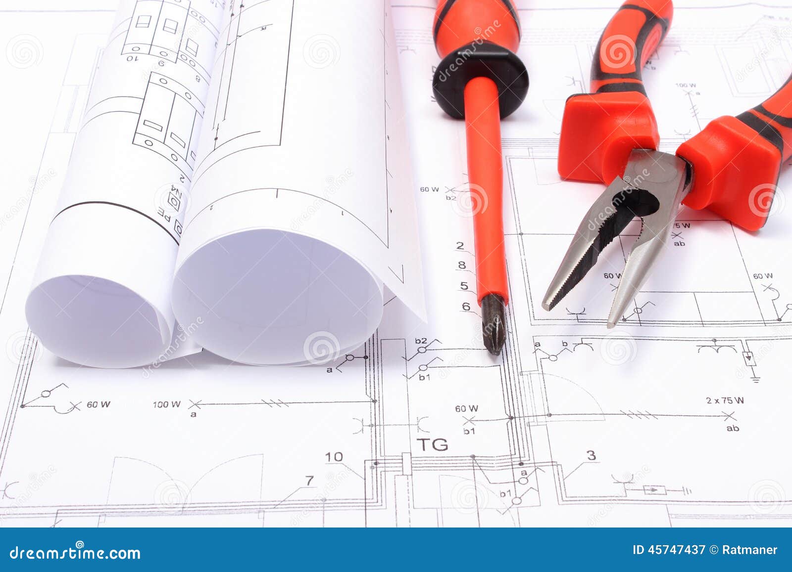 Rolled Electrical Diagrams and Work Tools on Construction Drawing of ...