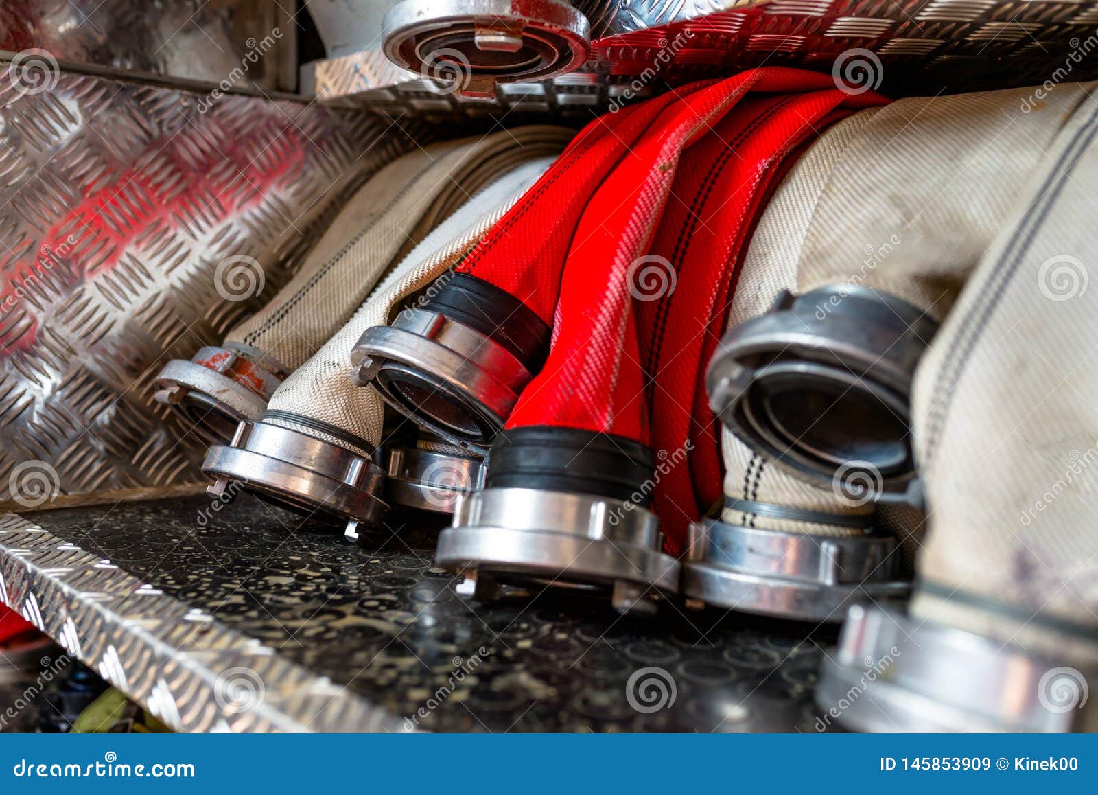 Old Rolled Fire Hose With Nozzle Royalty-Free Stock Photography ...