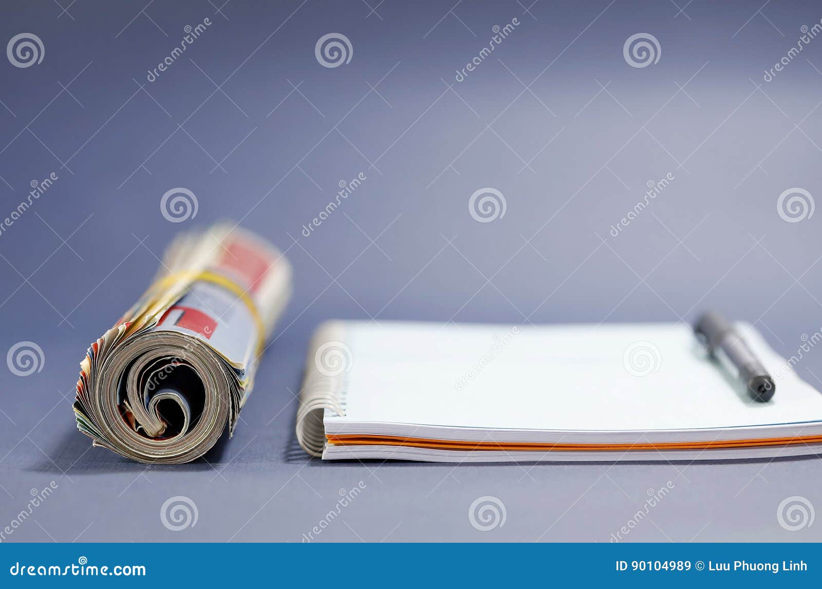 Rolled Magazine and Notebook Stock Image - Image of memo, installation ...