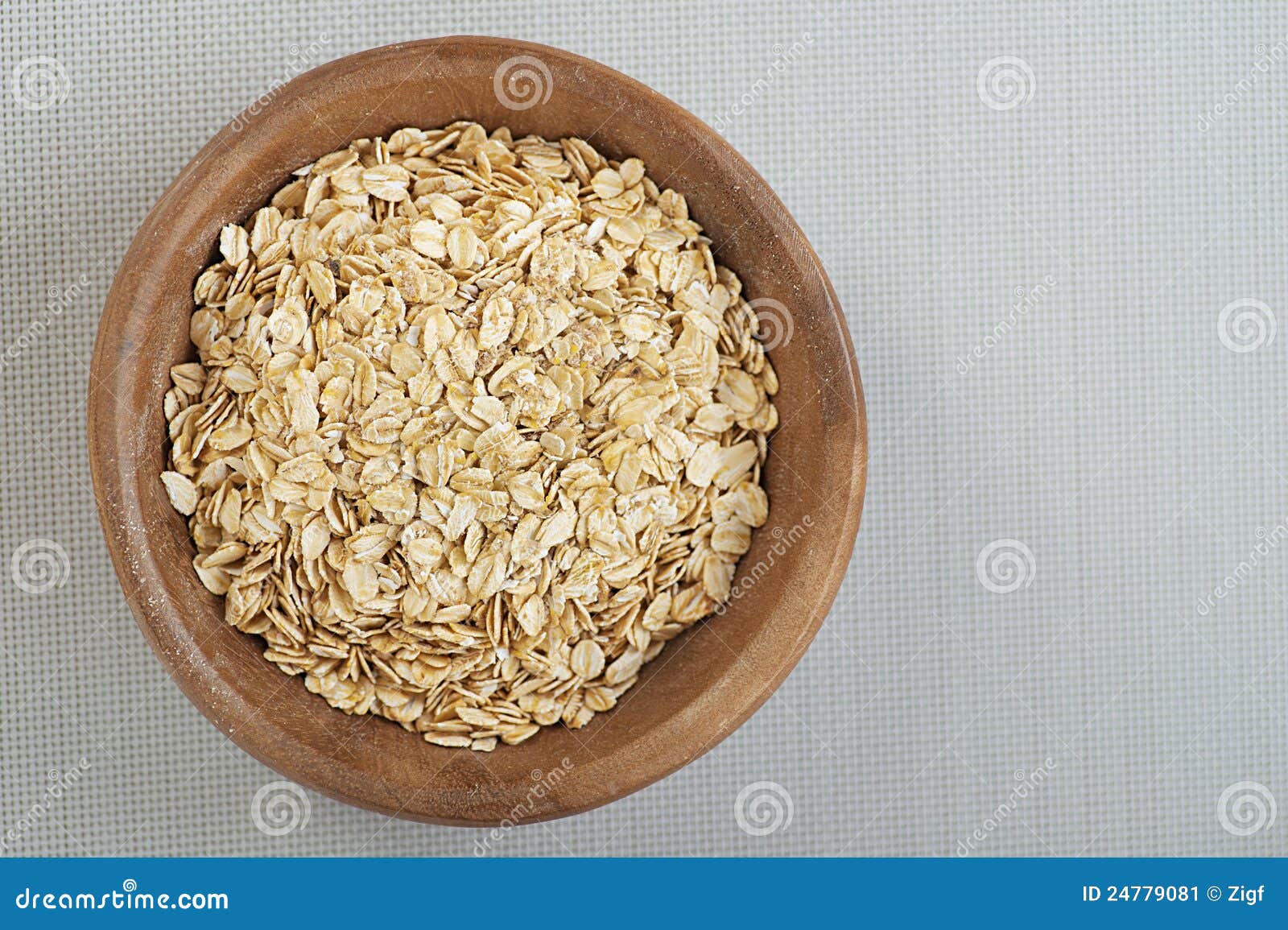 Rolled oats in a wooden stock image. Image of eatable - 24779081