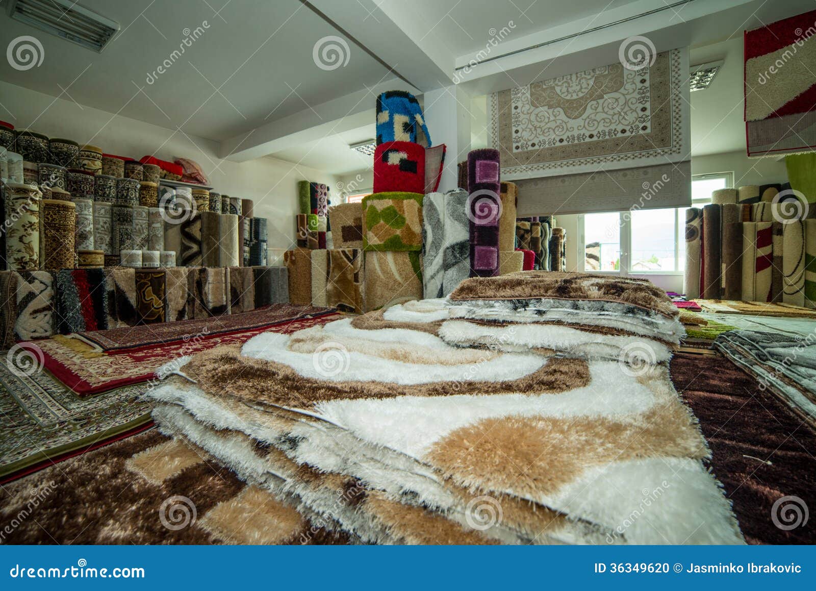 Rolled Rugs Inside a Rug Store Stock Photo - Image of textile, textured ...