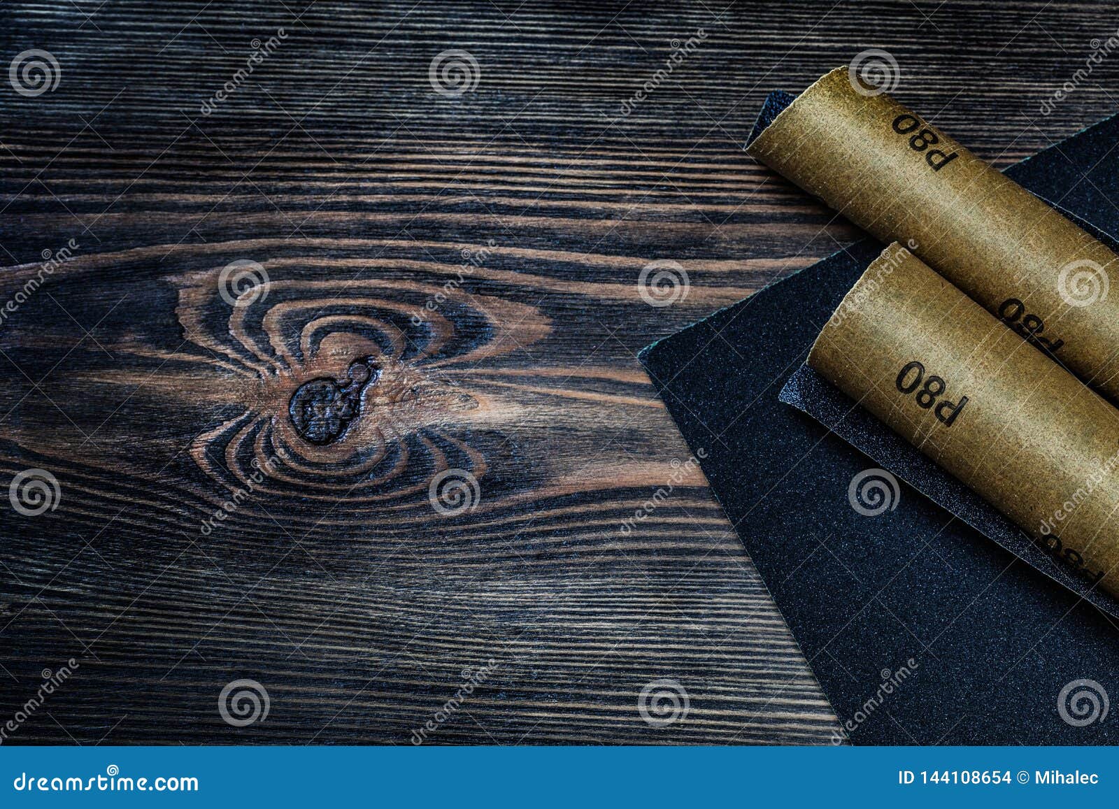 Rolled Sand Paper on Vintage Wood Stock Photo - Image of sanding ...