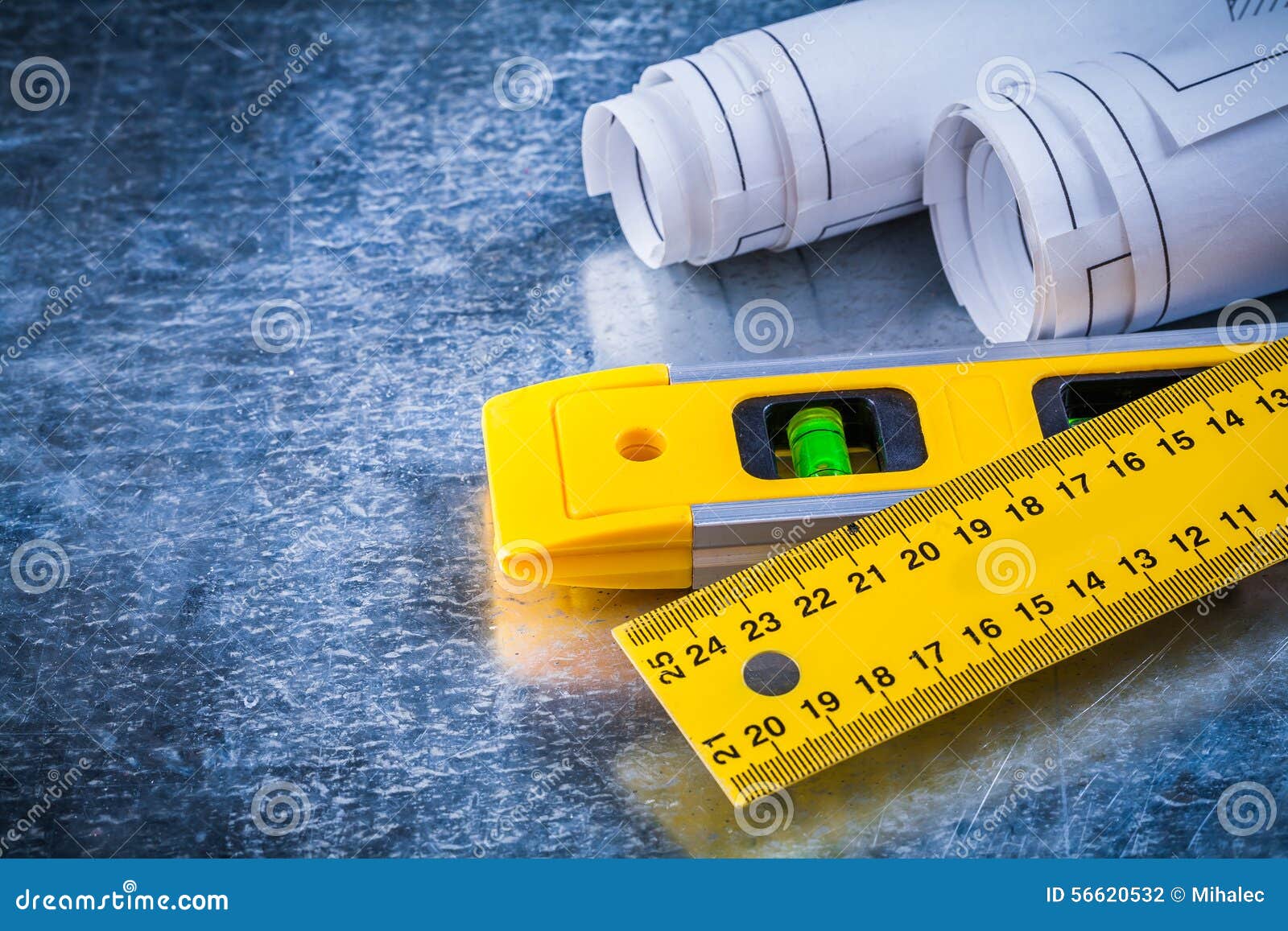 Rolled Up Blueprints Ruler and Construction Level Stock Photo - Image ...