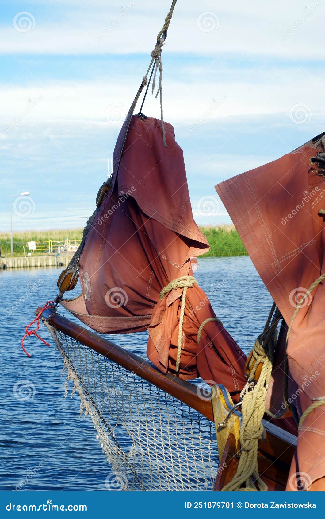 Rolled up brown sails stock image. Image of vehicle - 251879701