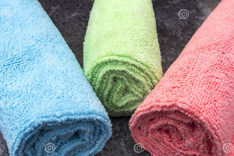 Rolled Up Cleaning Cloths stock photo. Image of rolled - 85930810