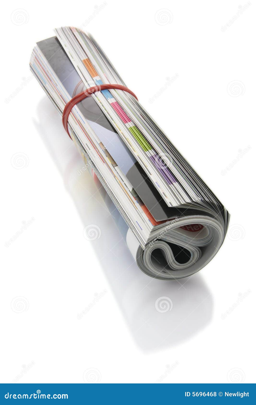 Rolled-up Magazine stock photo. Image of still, rubber - 5696468