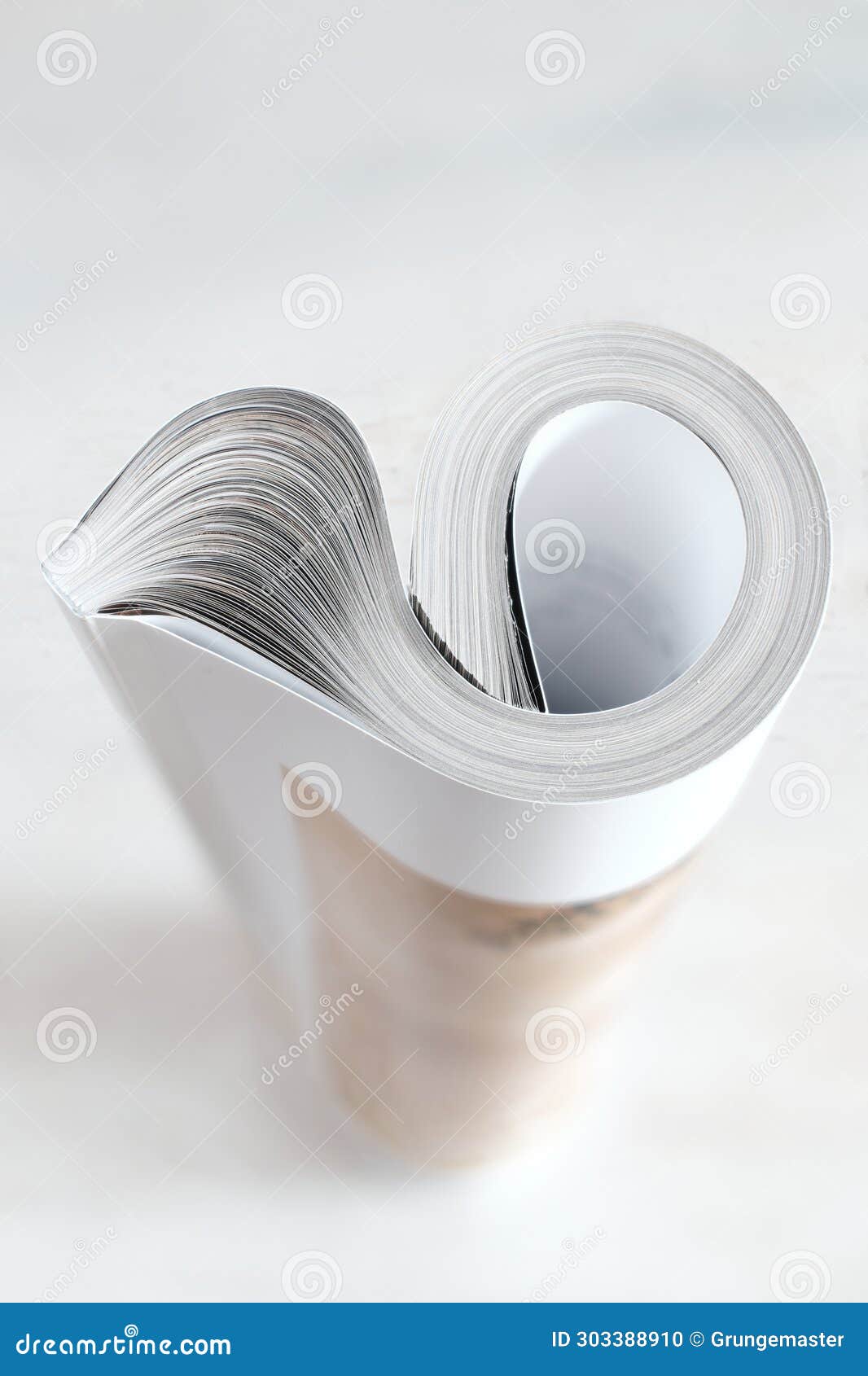 Rolled Up Magazine, Newspaper, Selective and Shallow Focus, White ...