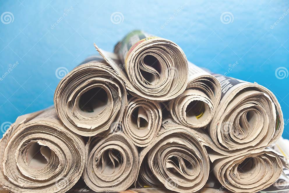 Rolled Up Newspapers in a Stack Stock Photo - Image of reporting ...