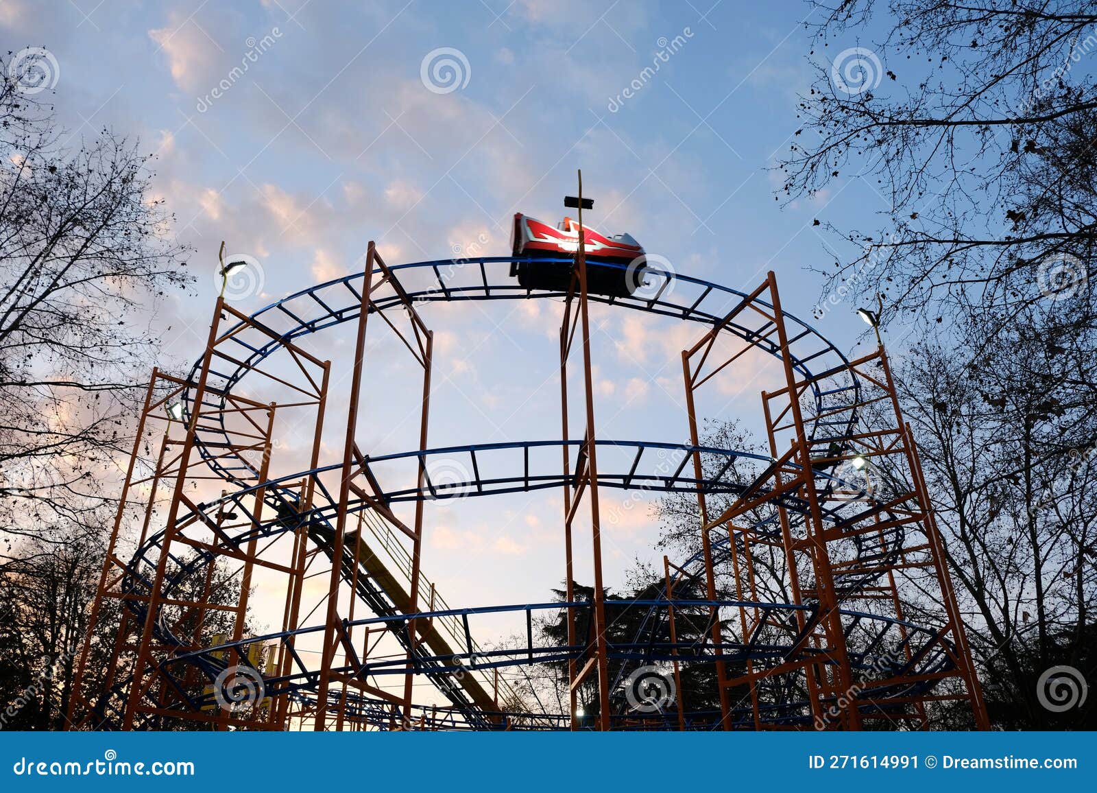 Roller Coaster Amusement Park Ride in the Luna Park during Sunset Stock ...