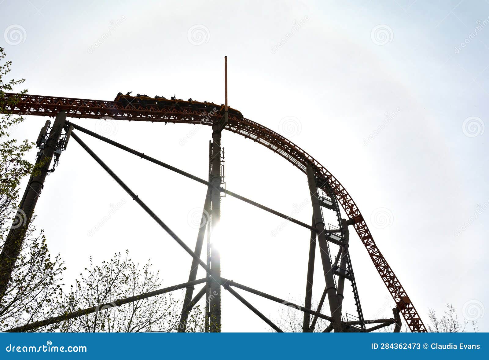 Roller Coaster in the Amusement Park with Sun Stock Image - Image of ...