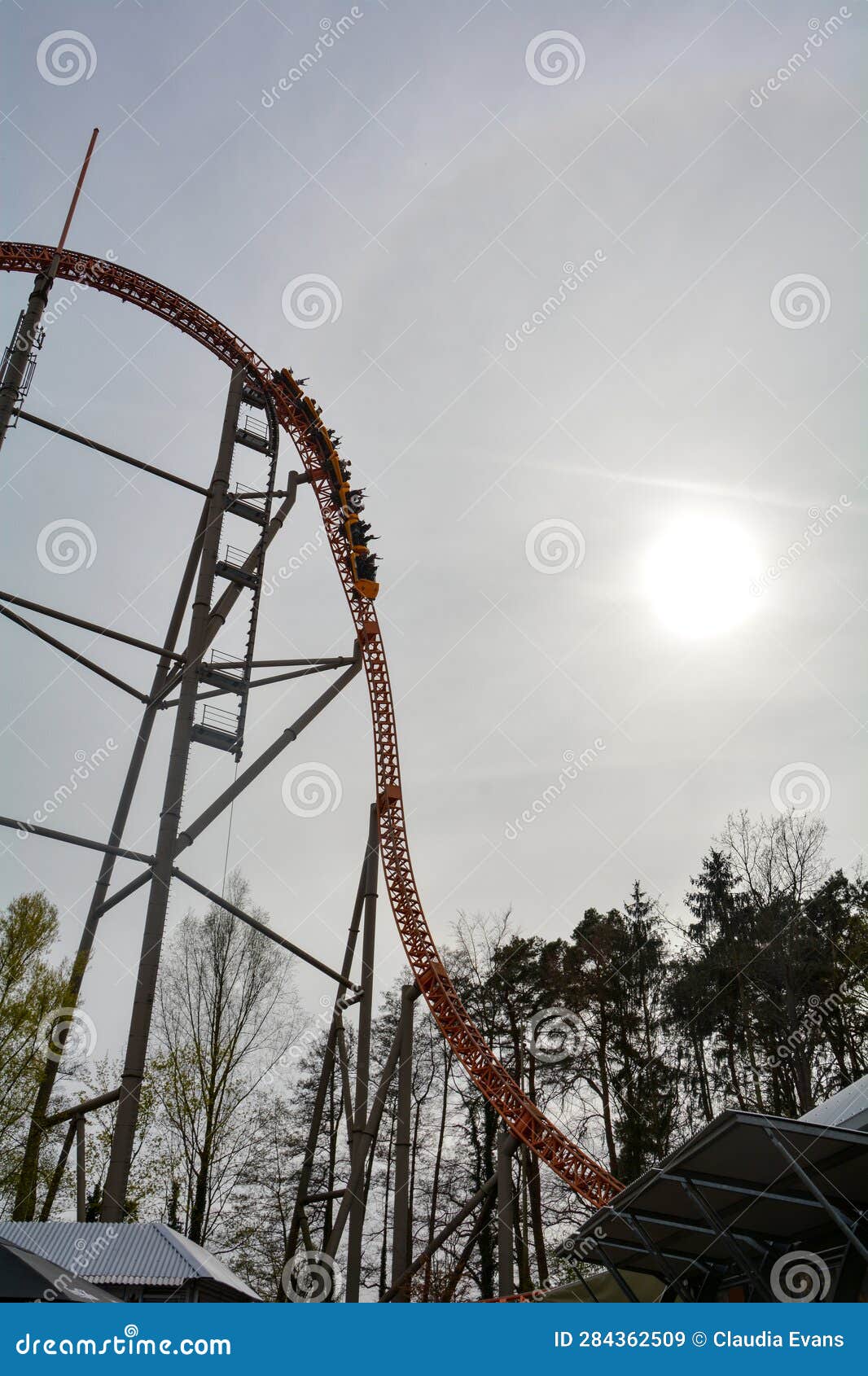 Roller Coaster in the Amusement Park with Sun Stock Image - Image of ...