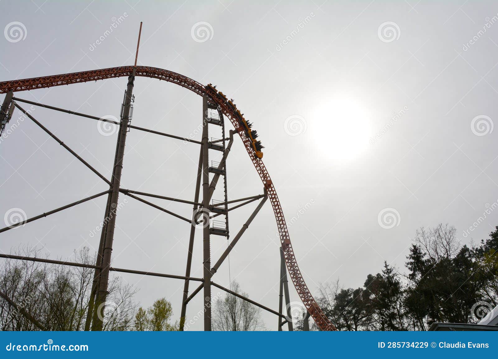 Roller Coaster in the Amusement Park with Sun Stock Image - Image of ...