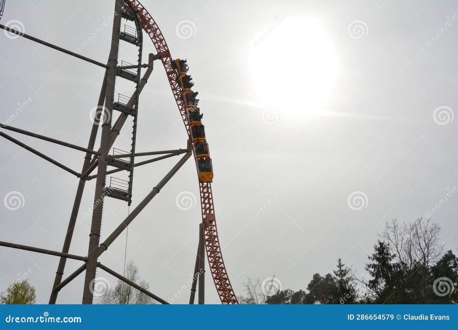 Roller Coaster in the Amusement Park with Sun Stock Image - Image of ...