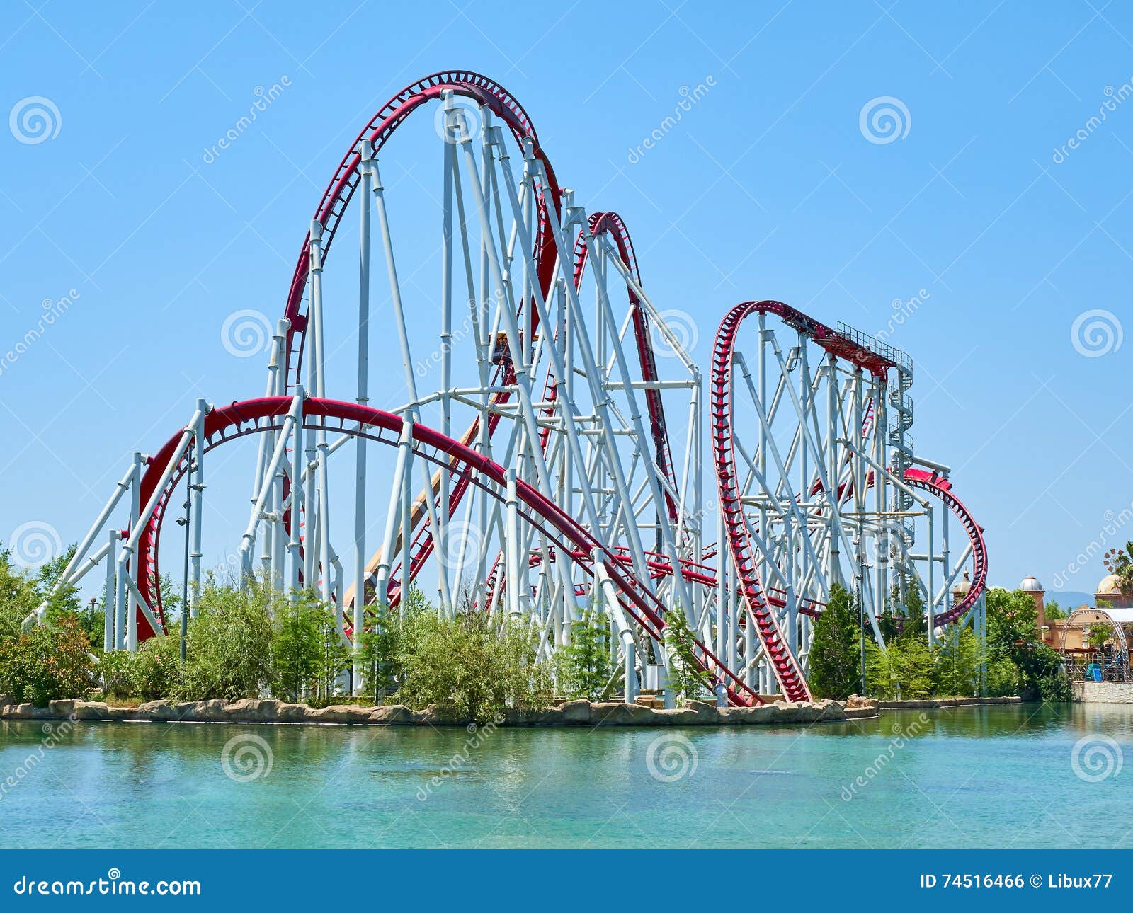 Roller coaster at funfair stock photo. Image of water - 74516466