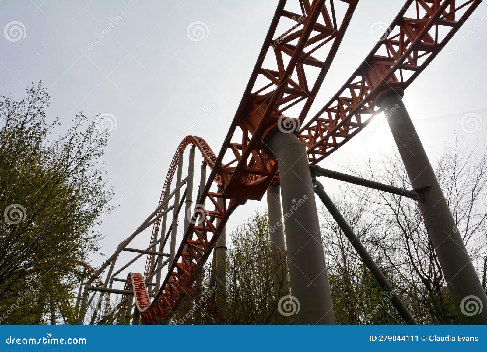 Roller Coaster Rails between Trees with Sun Editorial Photo - Image of ...