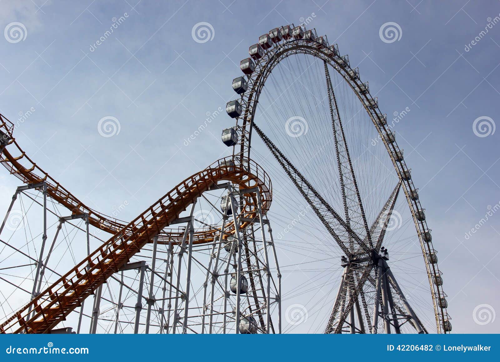 Roller Coaster Track and Ferris Wheel Stock Photo - Image of action ...