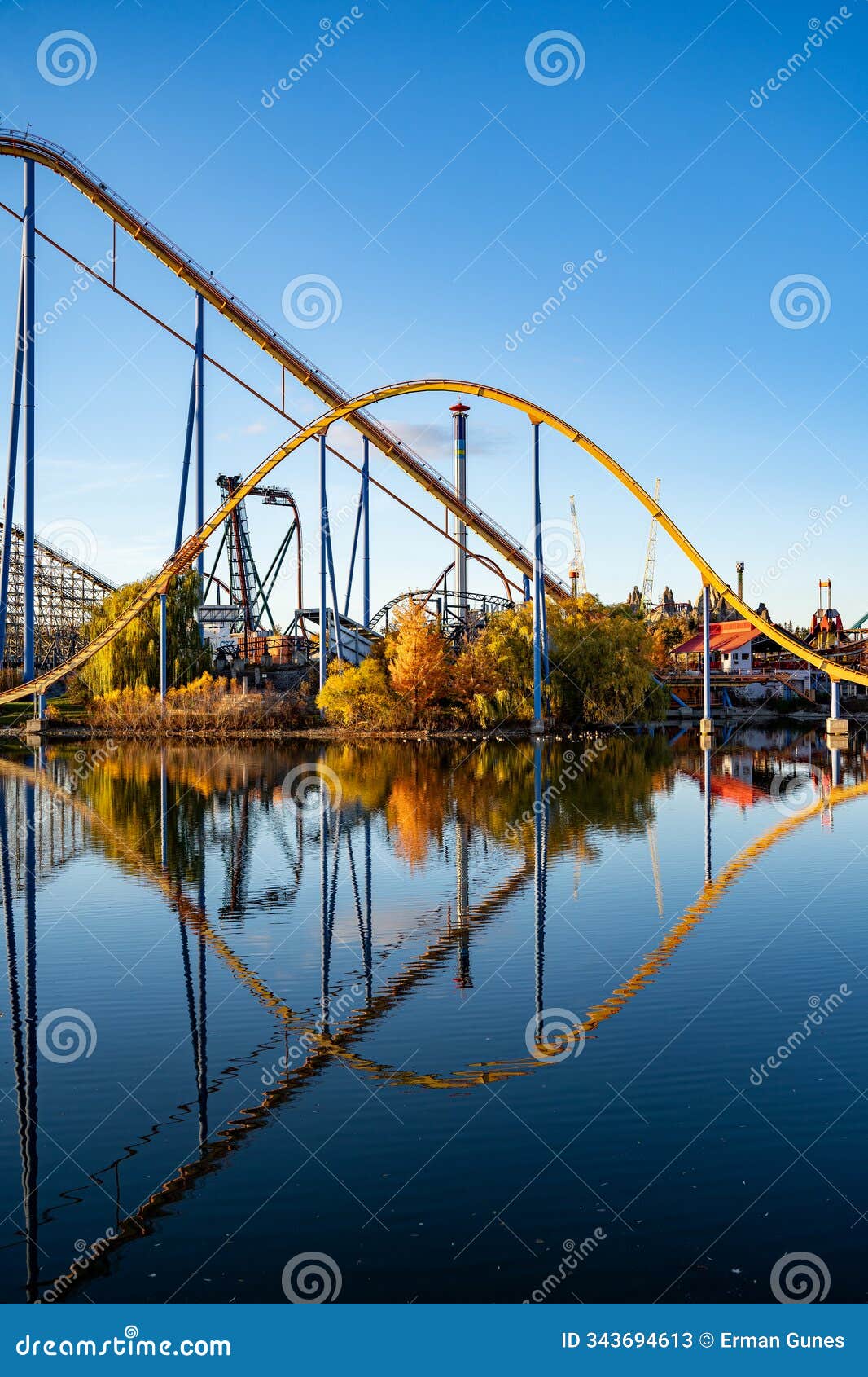 Roller Coaster and Water Reflection in Amusement Park Stock Image ...