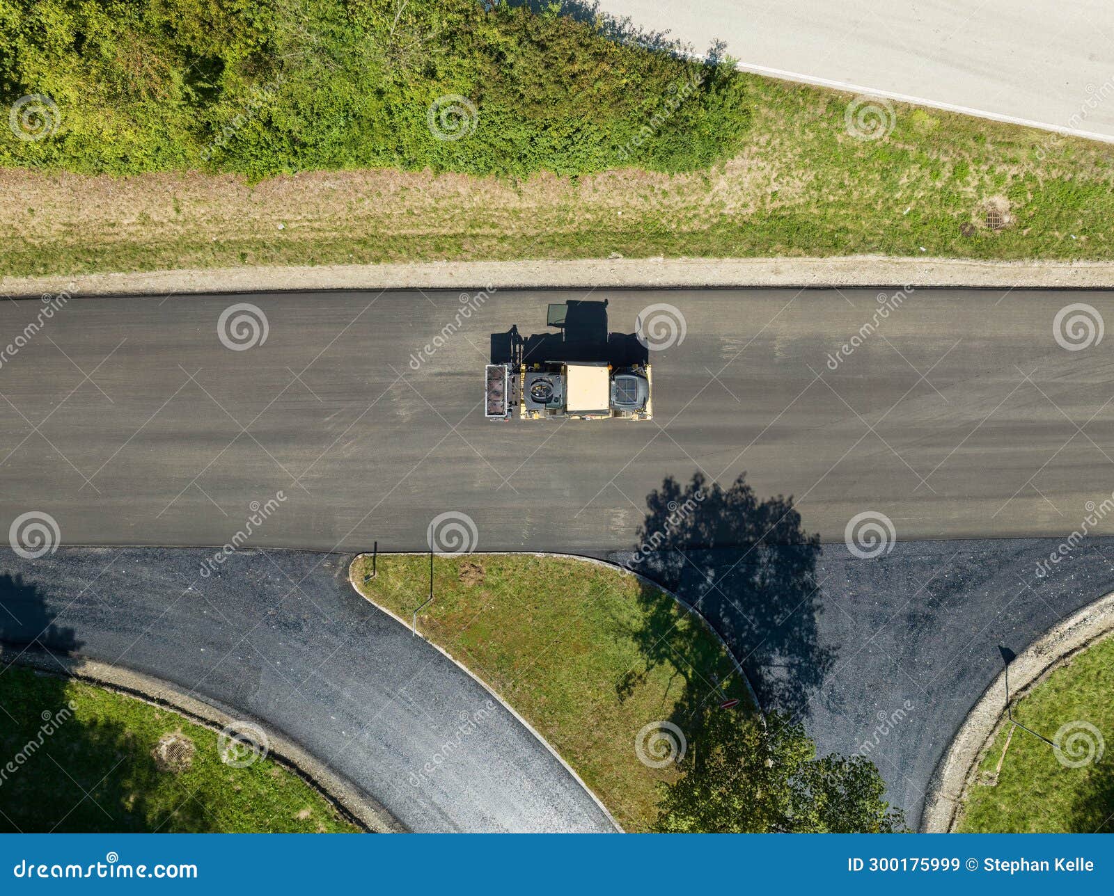 Roller Compacting Asphalt on a Road Construction Site from Above ...